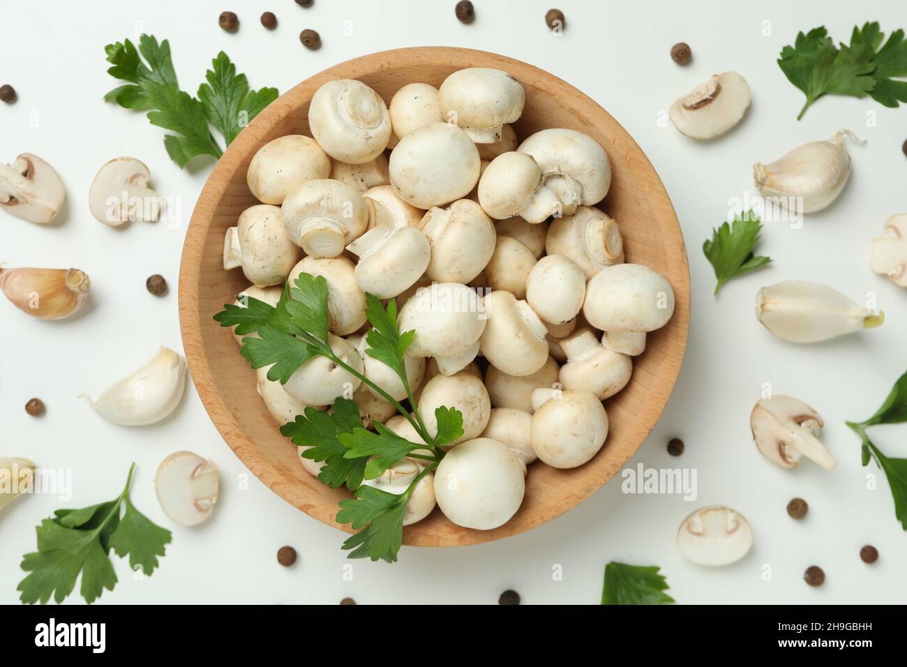 Concept of tasty food with champignon on white Stock Photo - Alamy