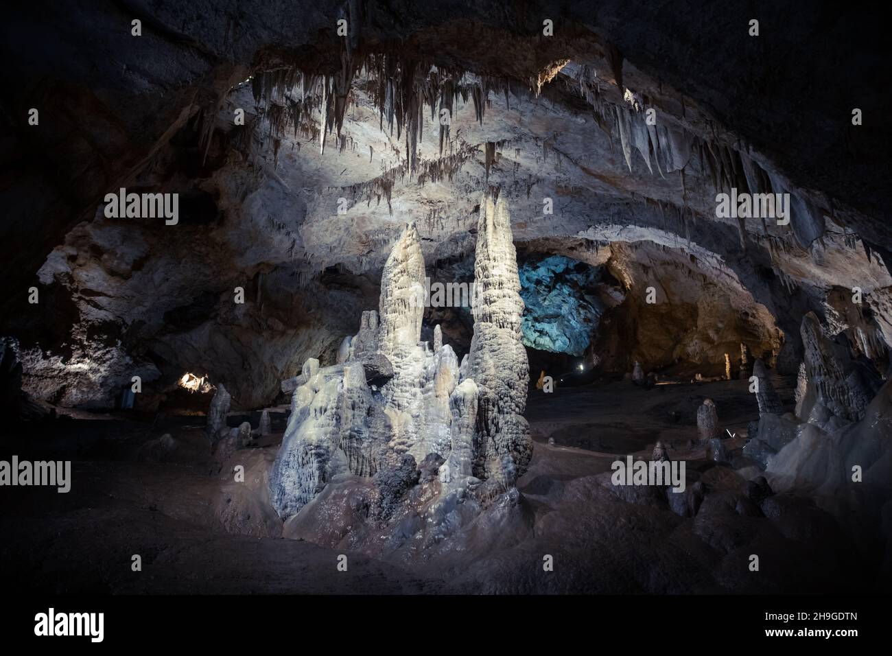 Image of a giant stalagmite in a an underground cave Stock Photo - Alamy