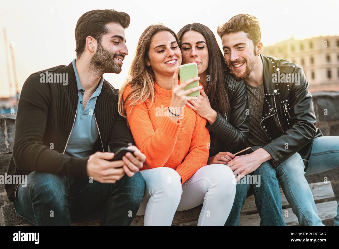 Young people friends carefree watching social media content on ...