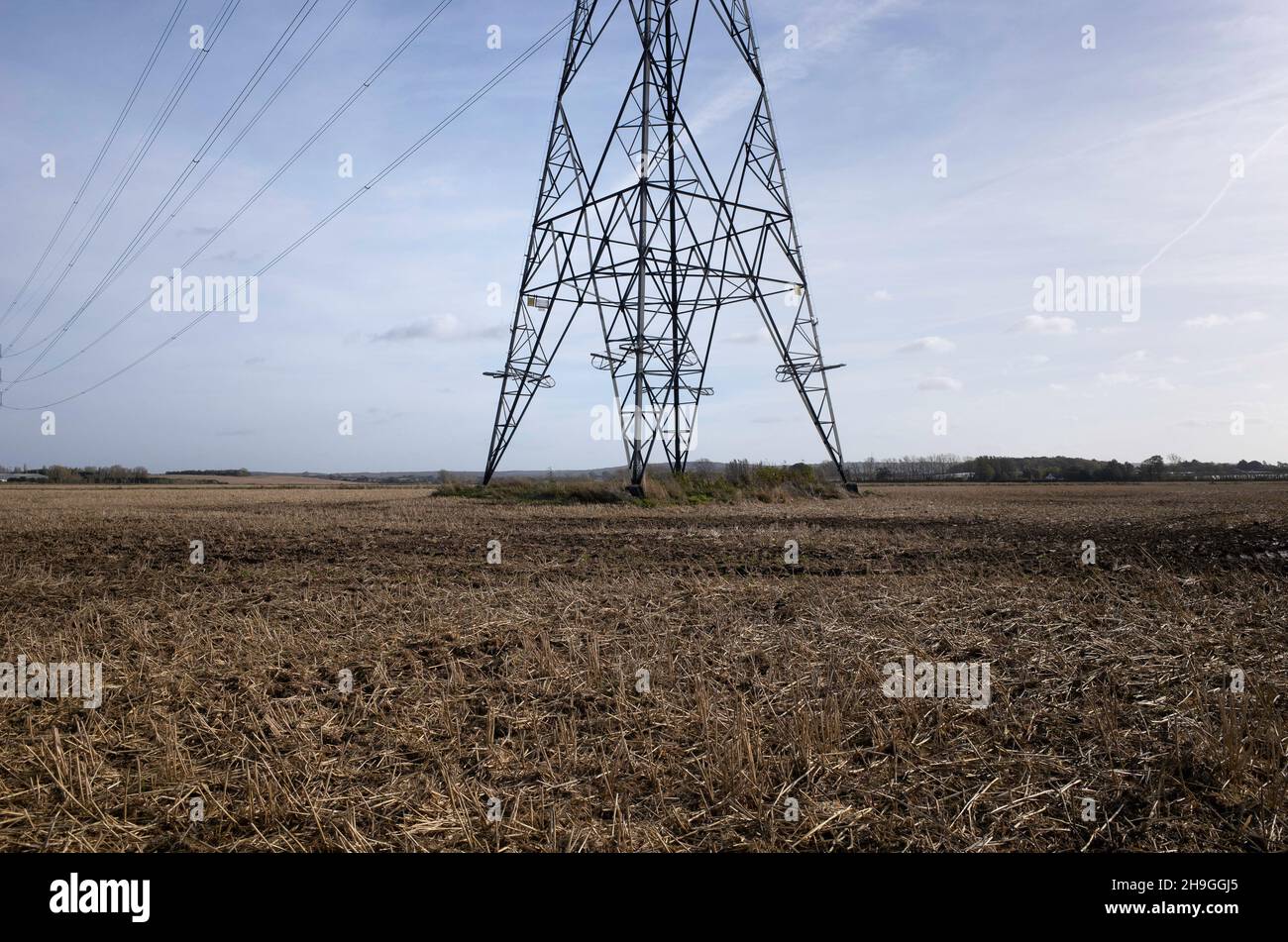 Electricity Pylon power lines stretching across the English Kent ...