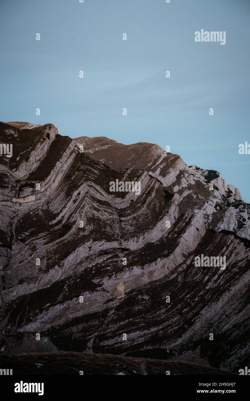 Vertical shot of high peak mountains Stock Photo - Alamy