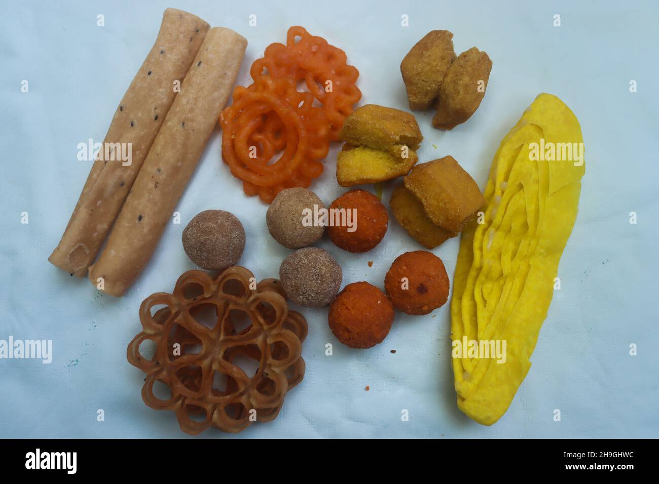 Kerala traditional cookies achappam kuzhalappam sweets jilebi laddu ...