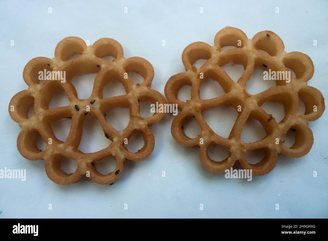 Kerala traditional cookies achappam kuzhalappam sweets jilebi laddu ...