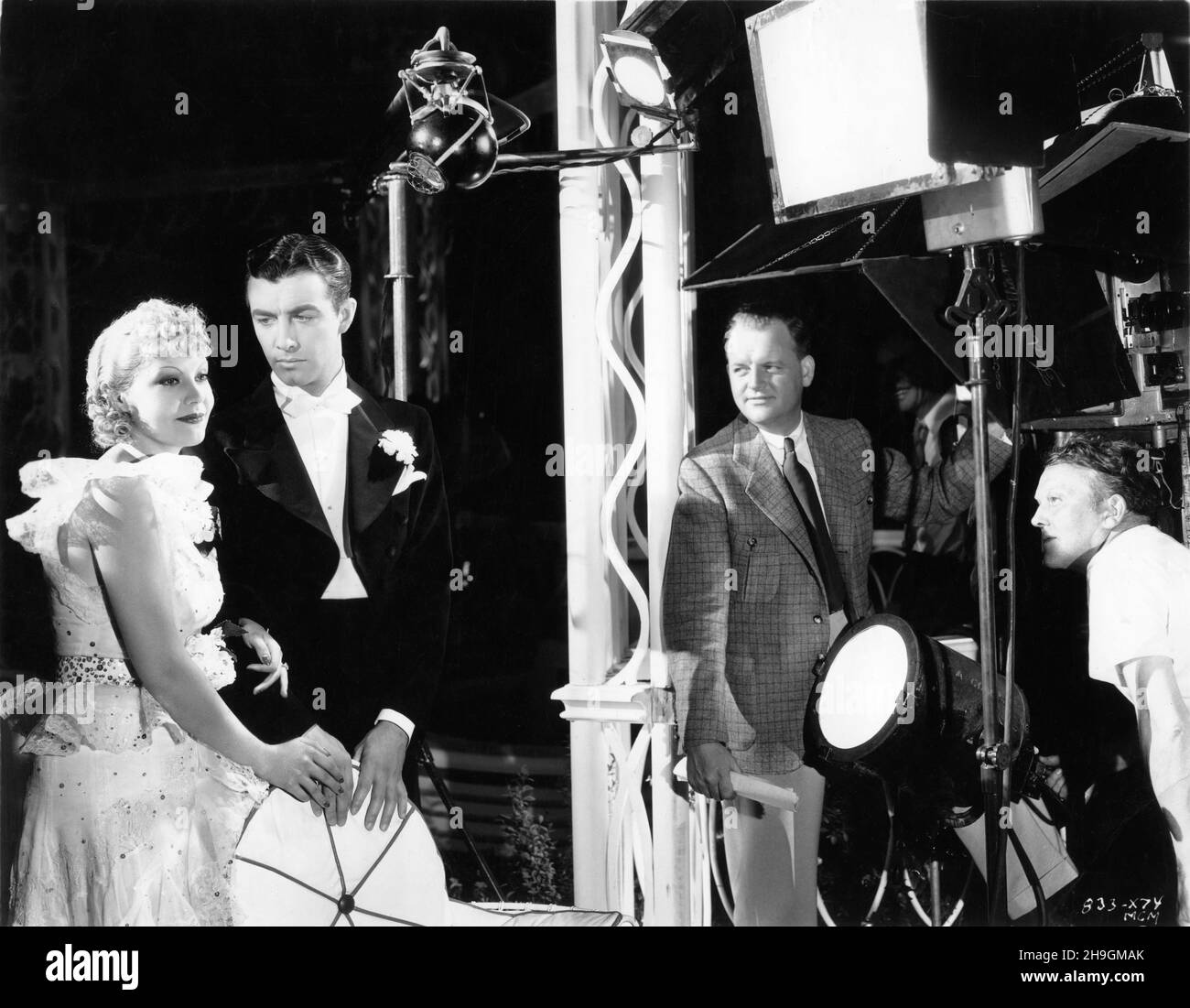 JUNE KNIGHT and ROBERT TAYLOR on set candid with Director ROY DEL RUTH ...