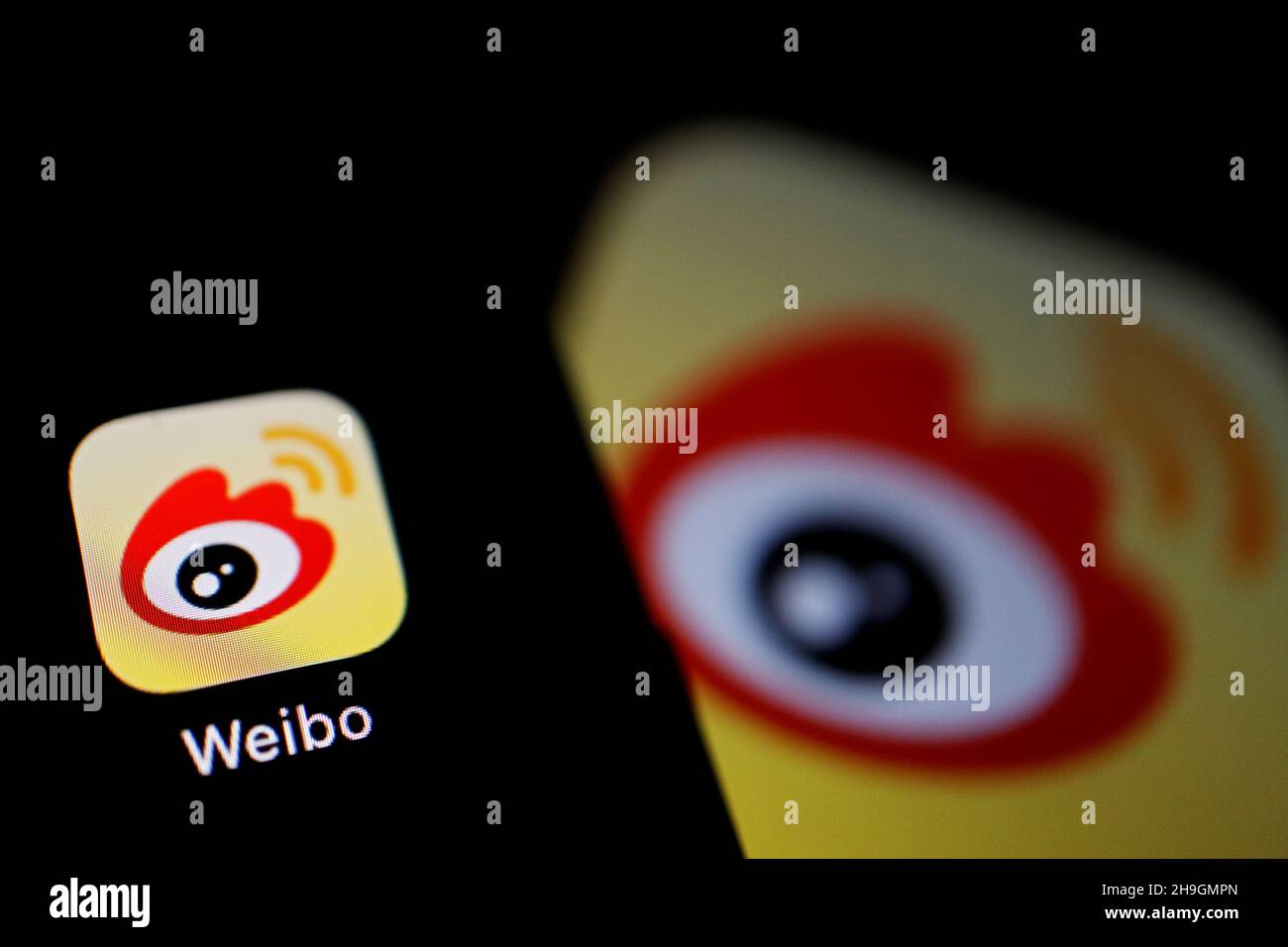 The logo of Chinese social media app Weibo is seen on a mobile phone in ...