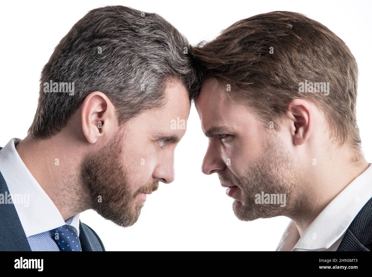 boss and employee. businessmen face to face. disagreed men partners ...