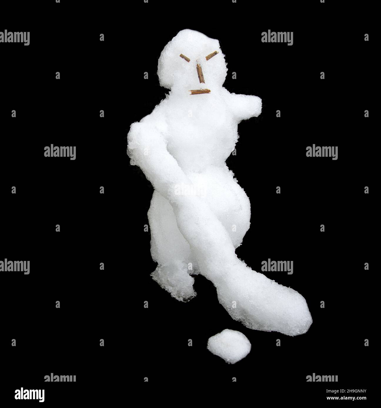 A snowman with a bandy, severe-looking (goalie mask). Professional ...