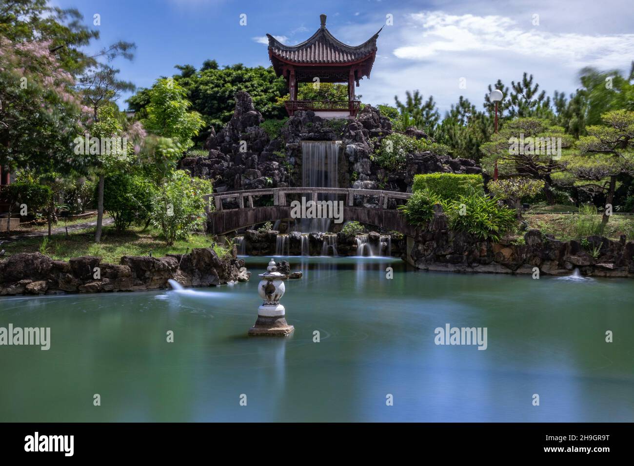 Waterfall at Fukushuen in Naha, Okinawa, Japan Stock Photo - Alamy
