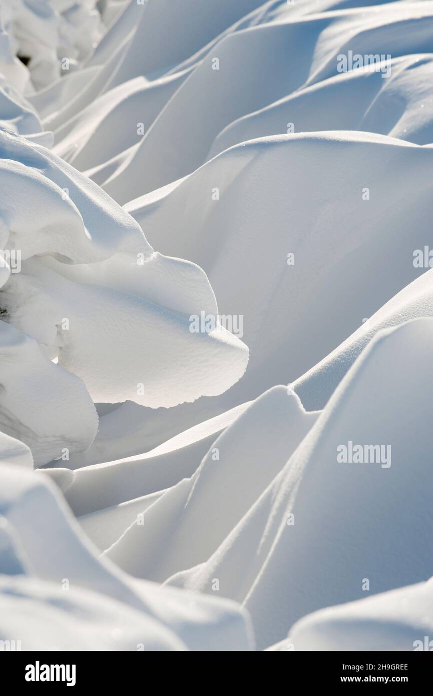Snow patterns formed by wind blown snow beside a drystone wall, Peak ...