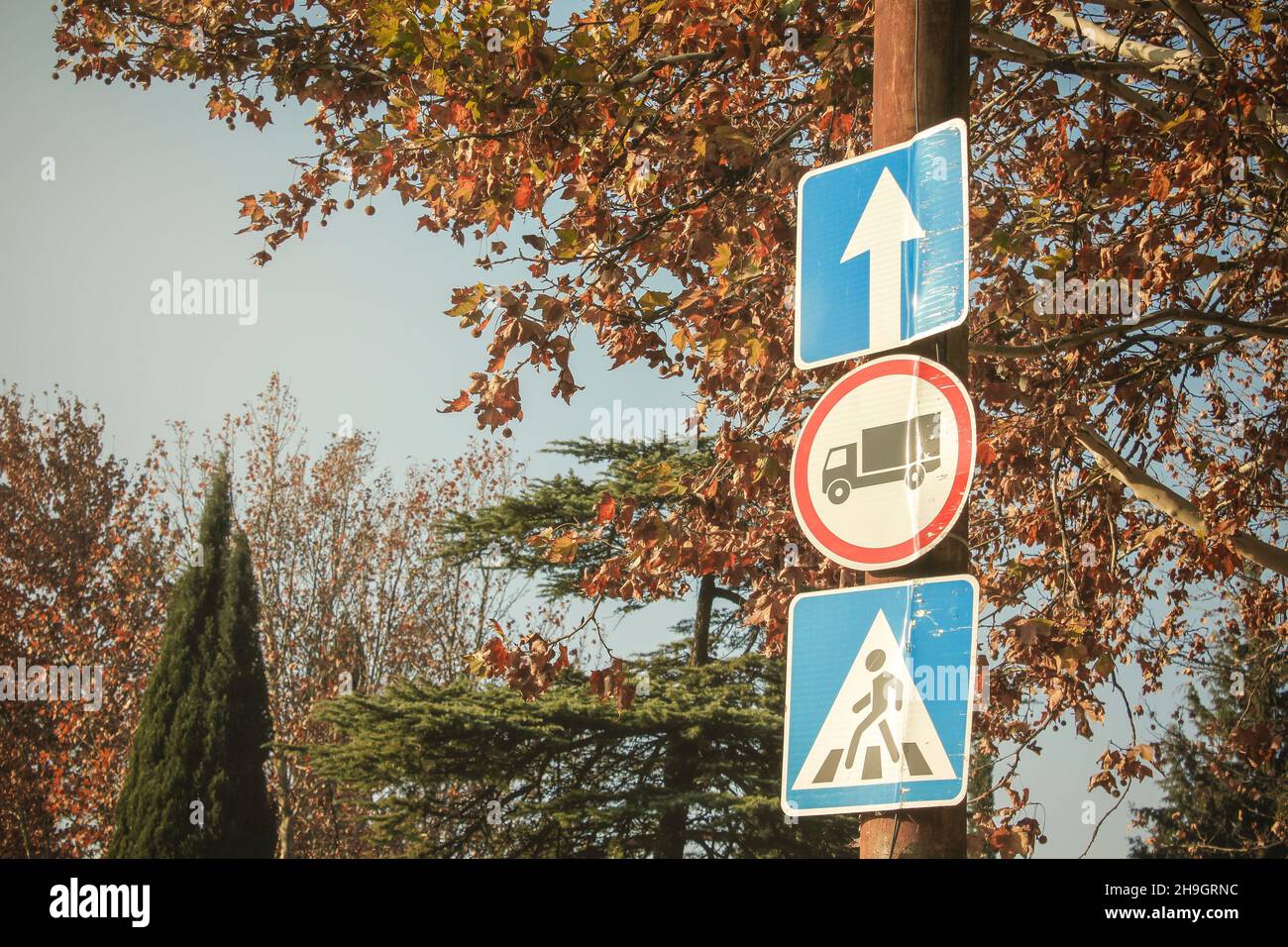 Various road signs in the street. Zebra crossing sign Stock Photo - Alamy