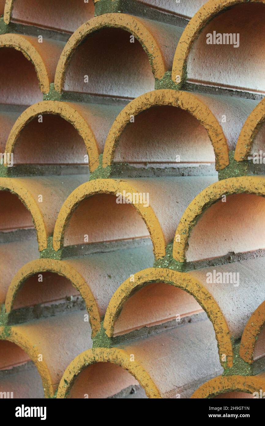 Beautiful arched clay tile open wall in the bright sunshine Stock Photo ...