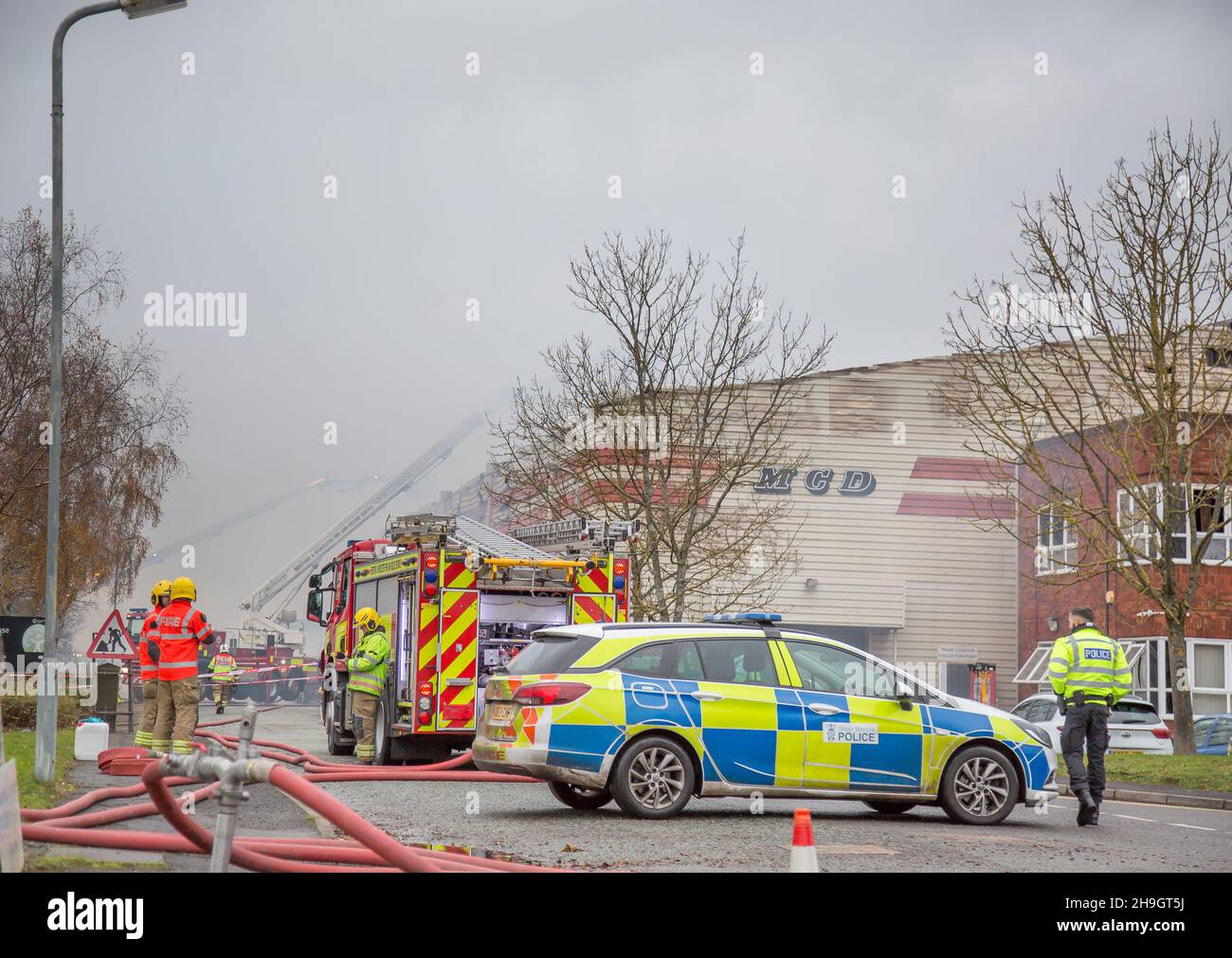 Kidderminster, UK, 7th December, 2021. Fire crews and police are still ...