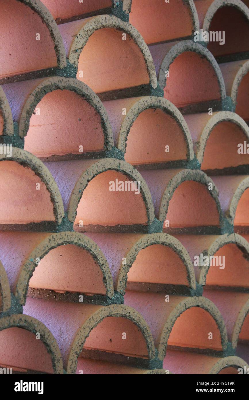Beautiful arched clay tile open wall in the bright sunshine Stock Photo ...