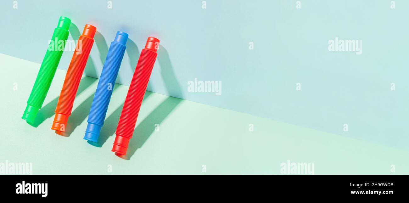 The straight folded pop tube stands leaning against the wall. Modern ...