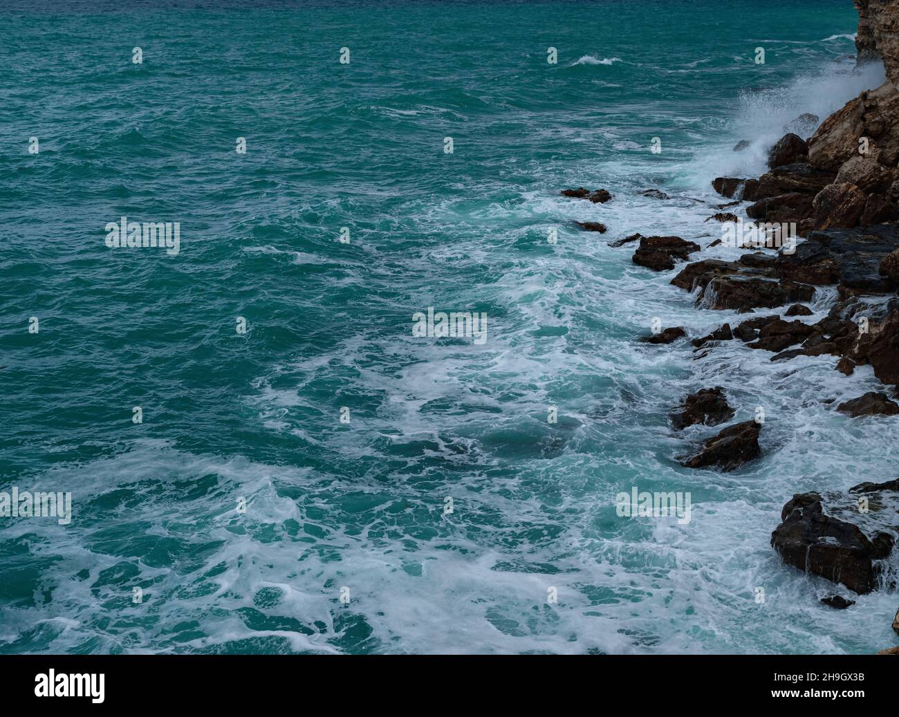 Beautiful view of ocean waves and a fantastic rocky shore, Sea patterns ...