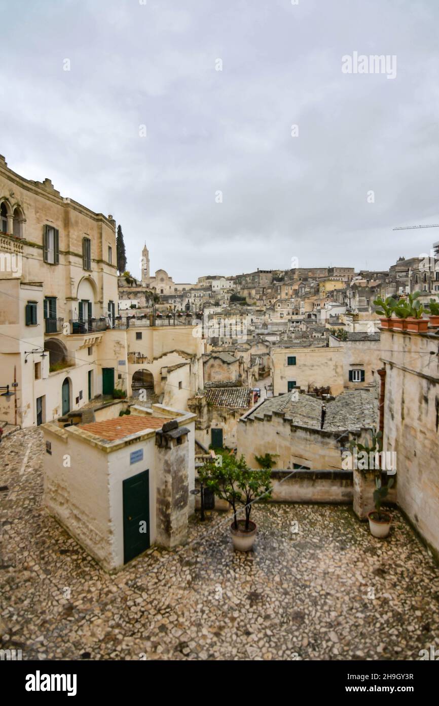 A street in Matera, an ancient city built into the rock. It is located ...