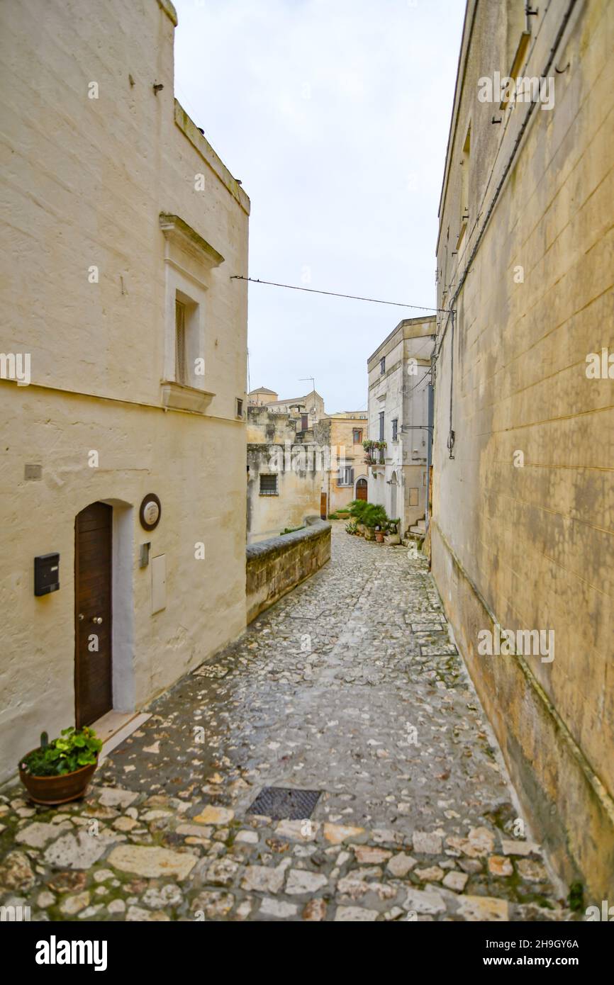 A street in Matera, an ancient city built into the rock. It is located ...