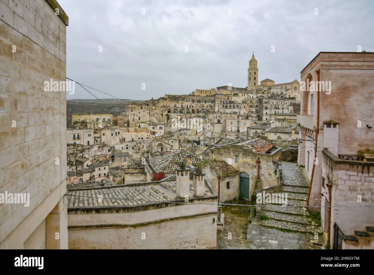 A street in Matera, an ancient city built into the rock. It is located ...