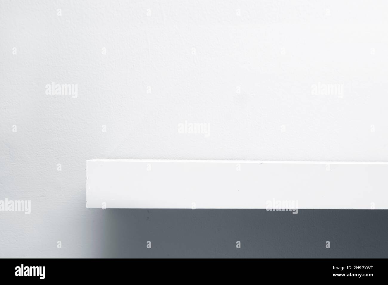 Concrete shelf table on white wall background Stock Photo - Alamy