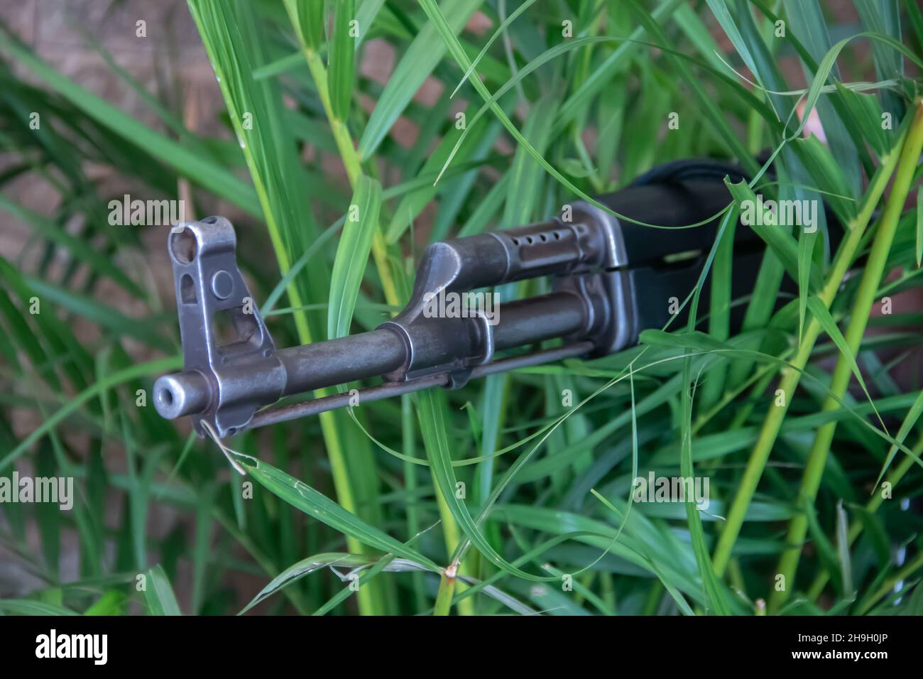 Pipe of Kalashnikov aka AK47 hold by member of Nigeria special forces ...
