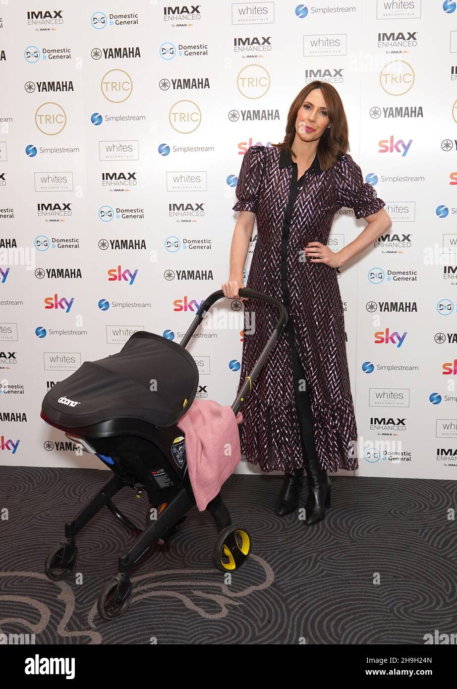 Alex Jones, with her baby daughter Annie, arrives at the TRIC ...
