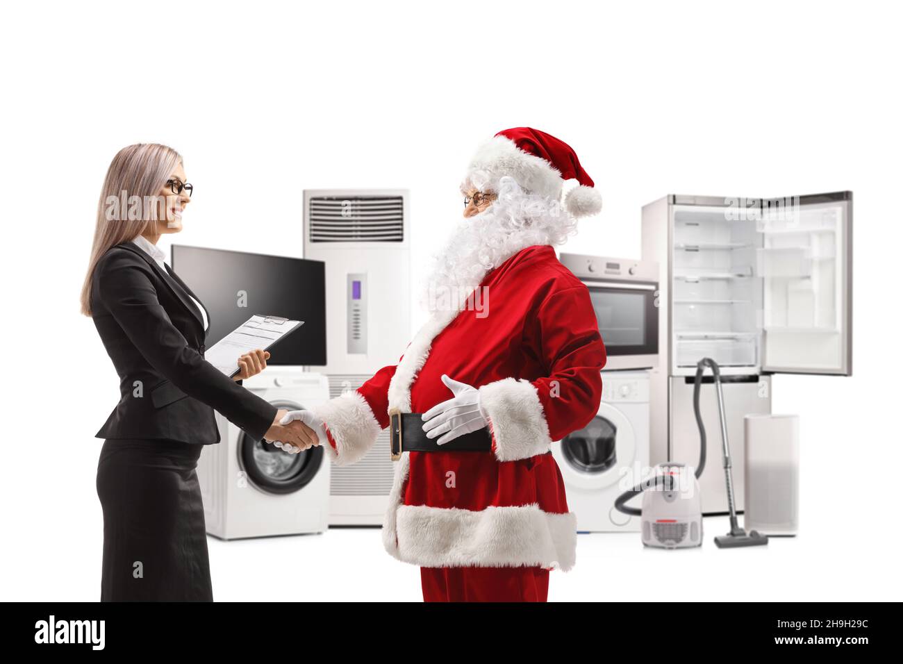 Santa claus shaking hands with a female manager in a home electrical ...