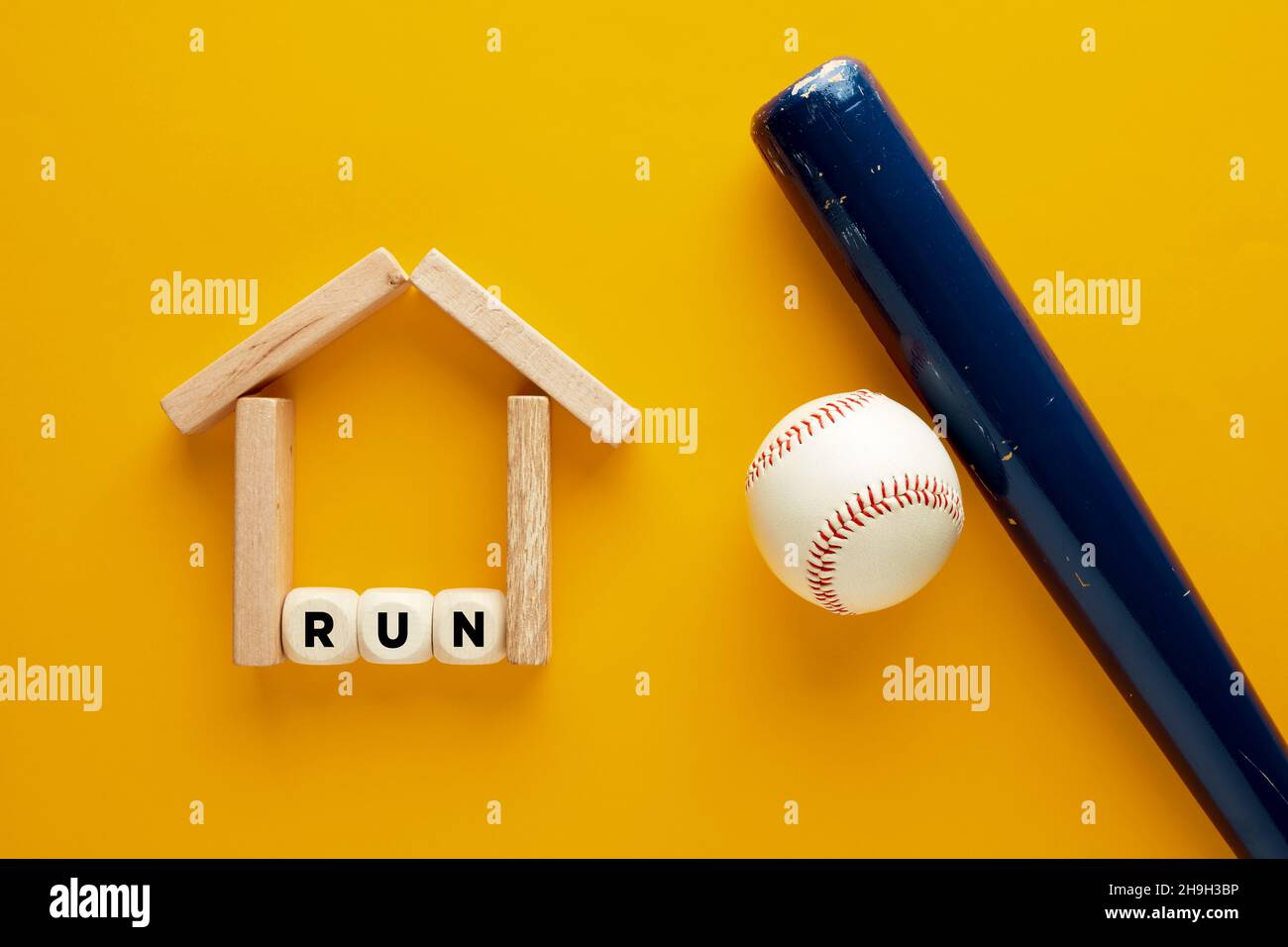 Baseball ball and wooden bat on yellow background with the home run ...