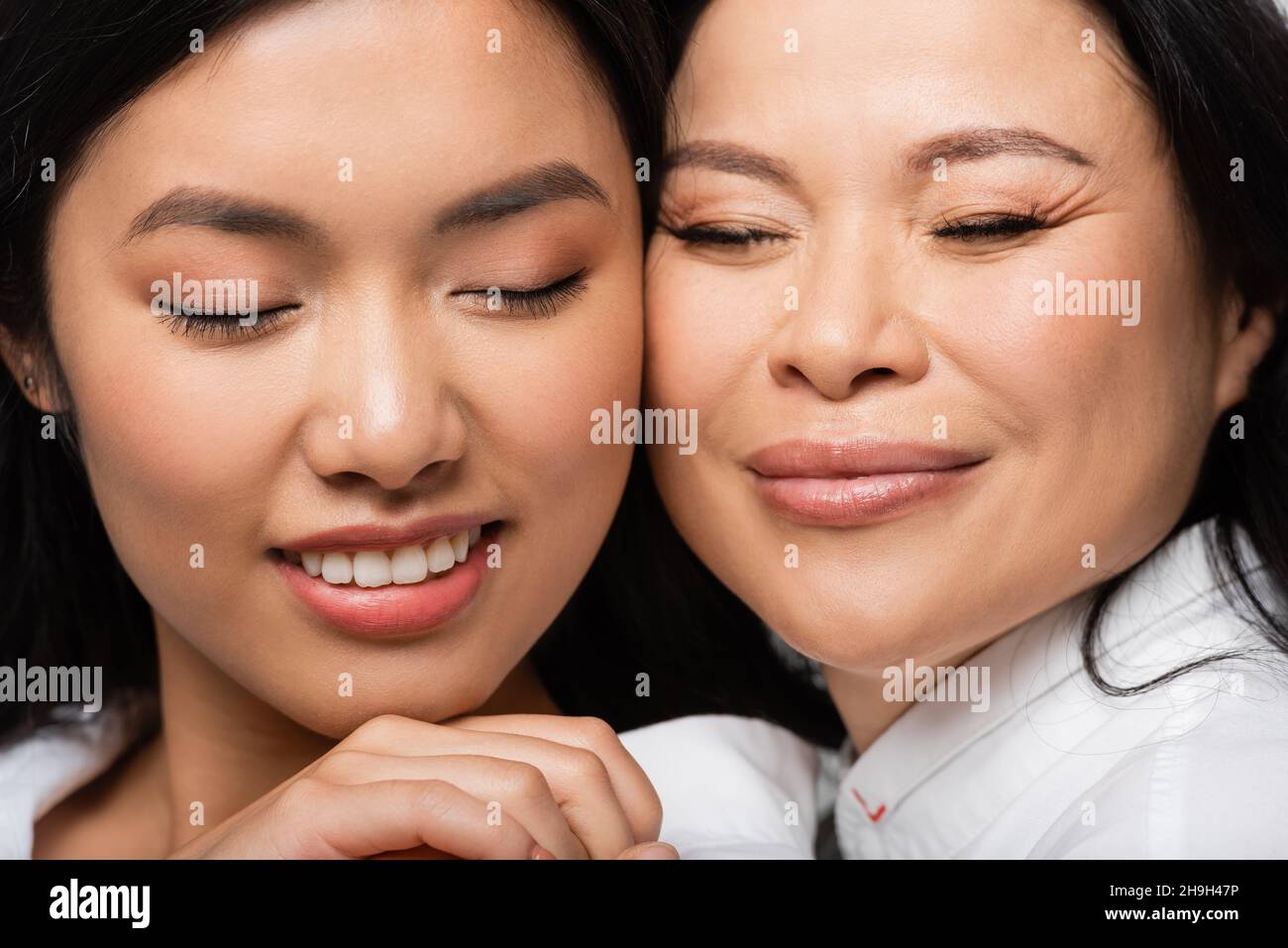 Cheerful young family hi-res stock photography and images - Alamy