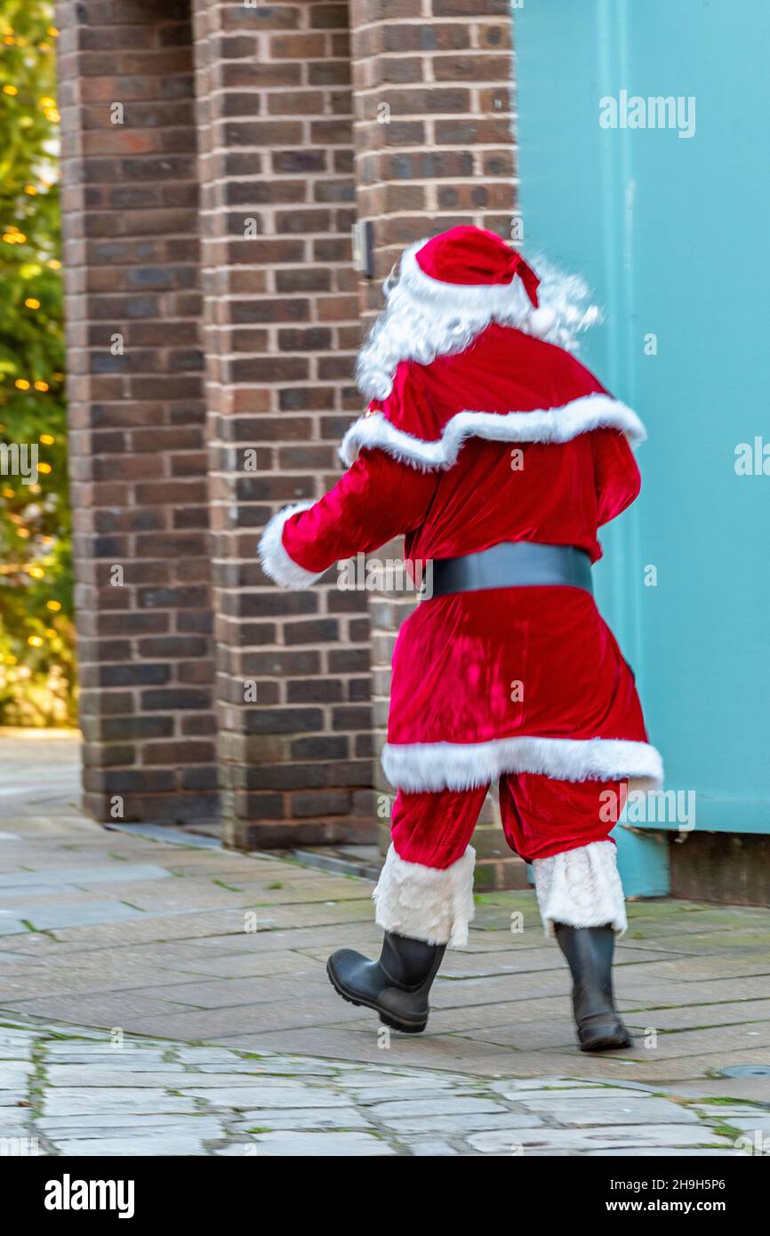man dressed in santa claus or father christmas costume, santa walking ...