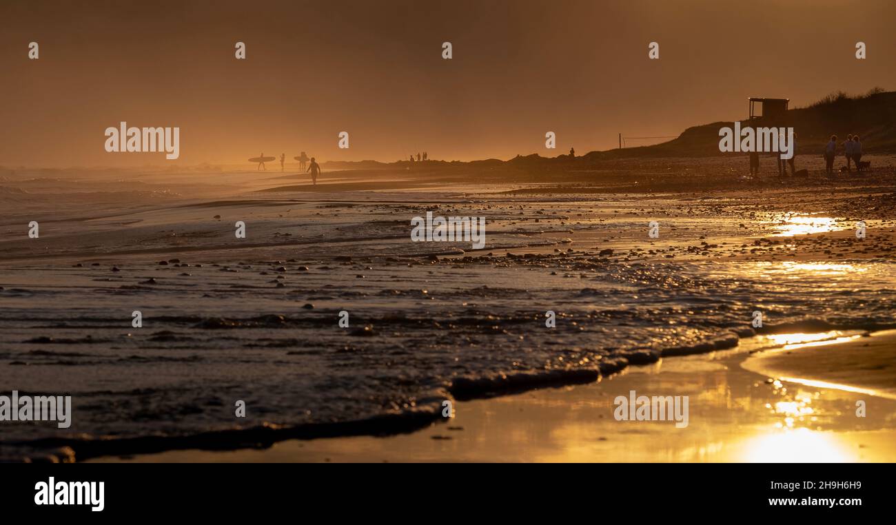 Gorgeous sunset with some golden myst at Bella Vista beach. Some ...