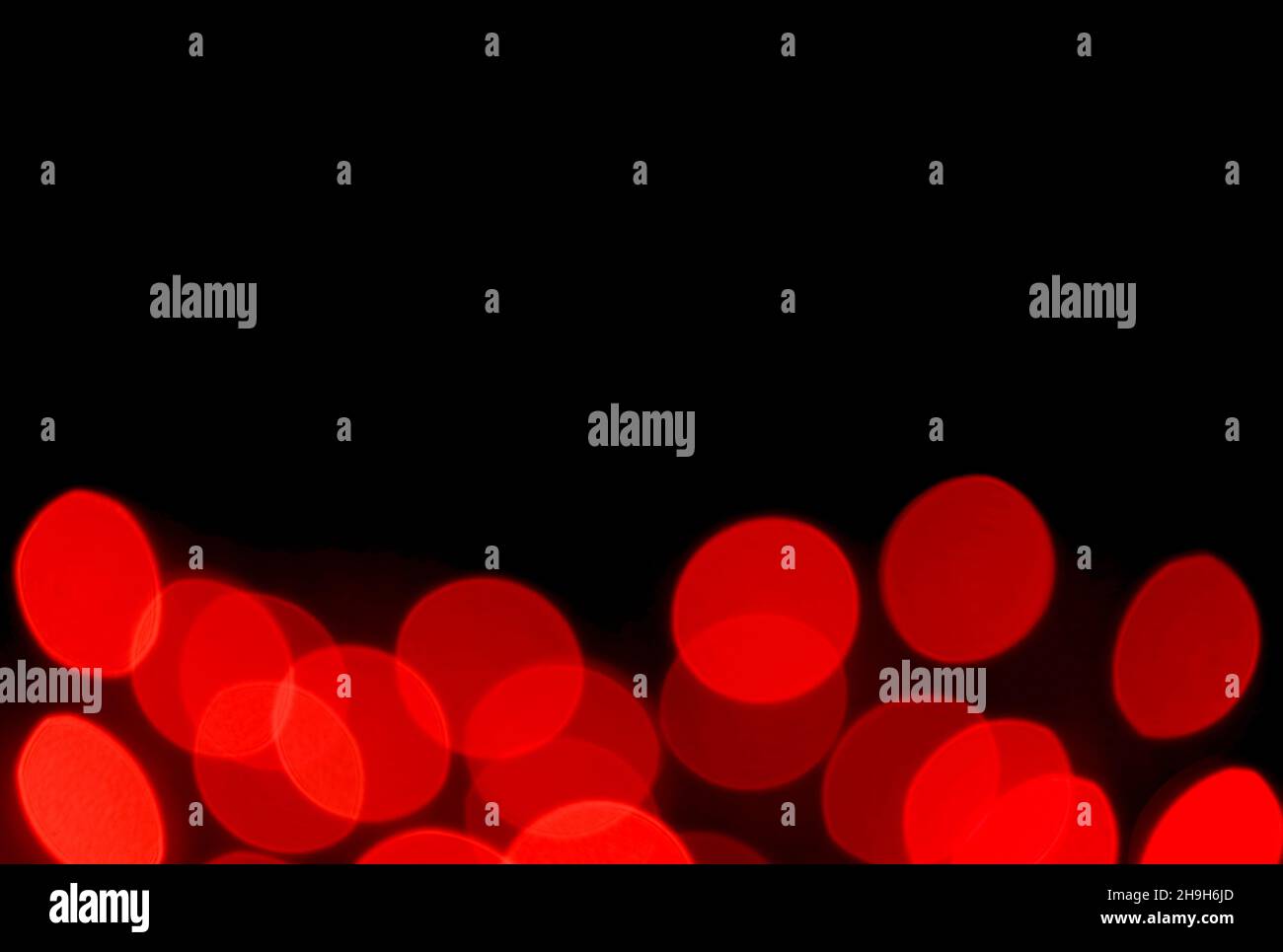 Abstract Blurred Candy Apple Red Illuminated Light on Dark Background ...