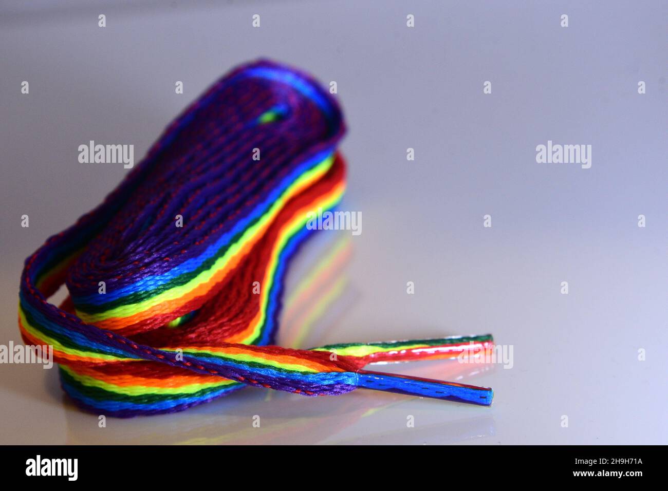 Rainbow Laces on white background Stock Photo - Alamy