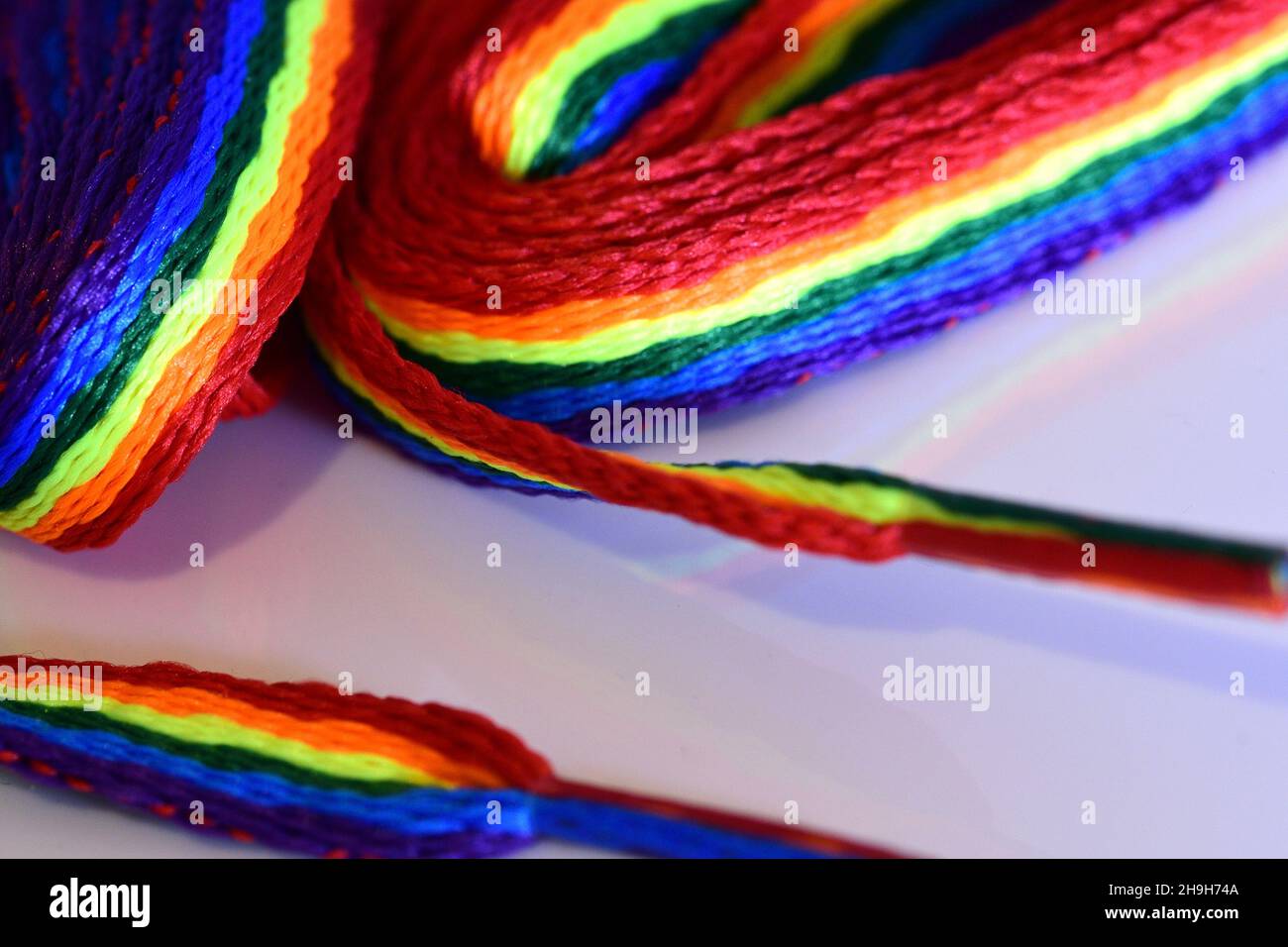 Rainbow Laces on white background Stock Photo - Alamy