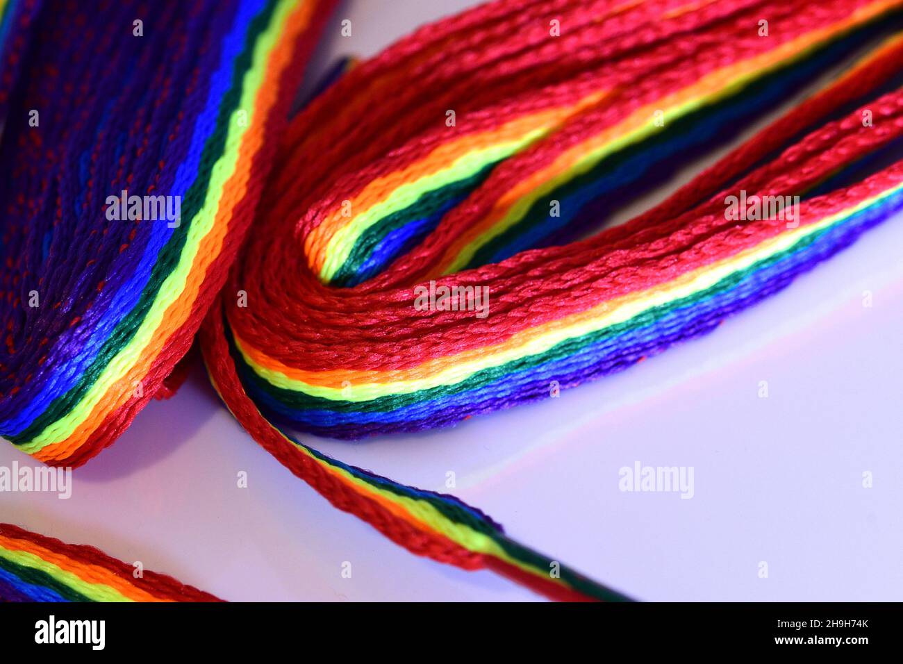Rainbow Laces on white background Stock Photo - Alamy