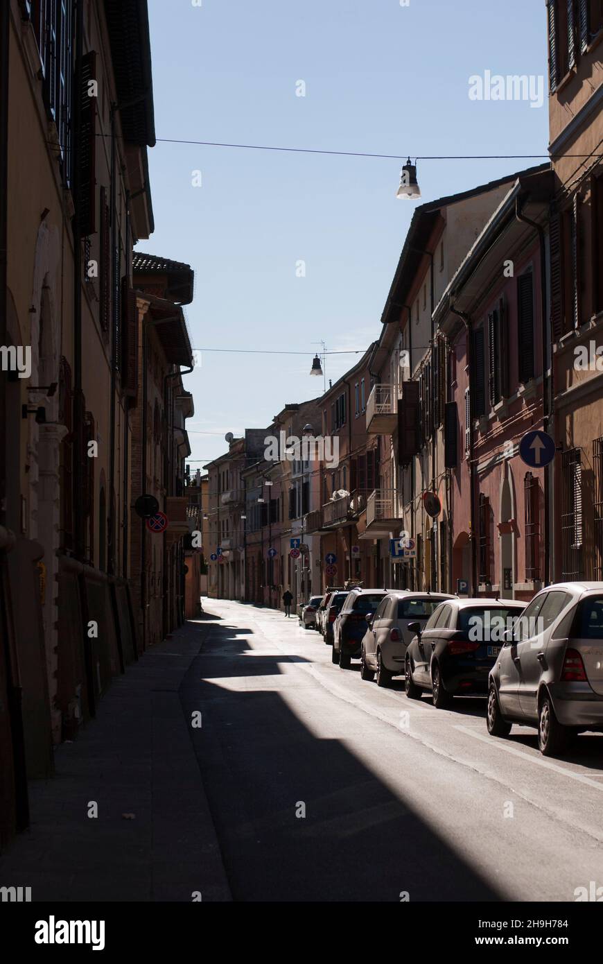 Passage through street with buildings in Italy Stock Photo - Alamy