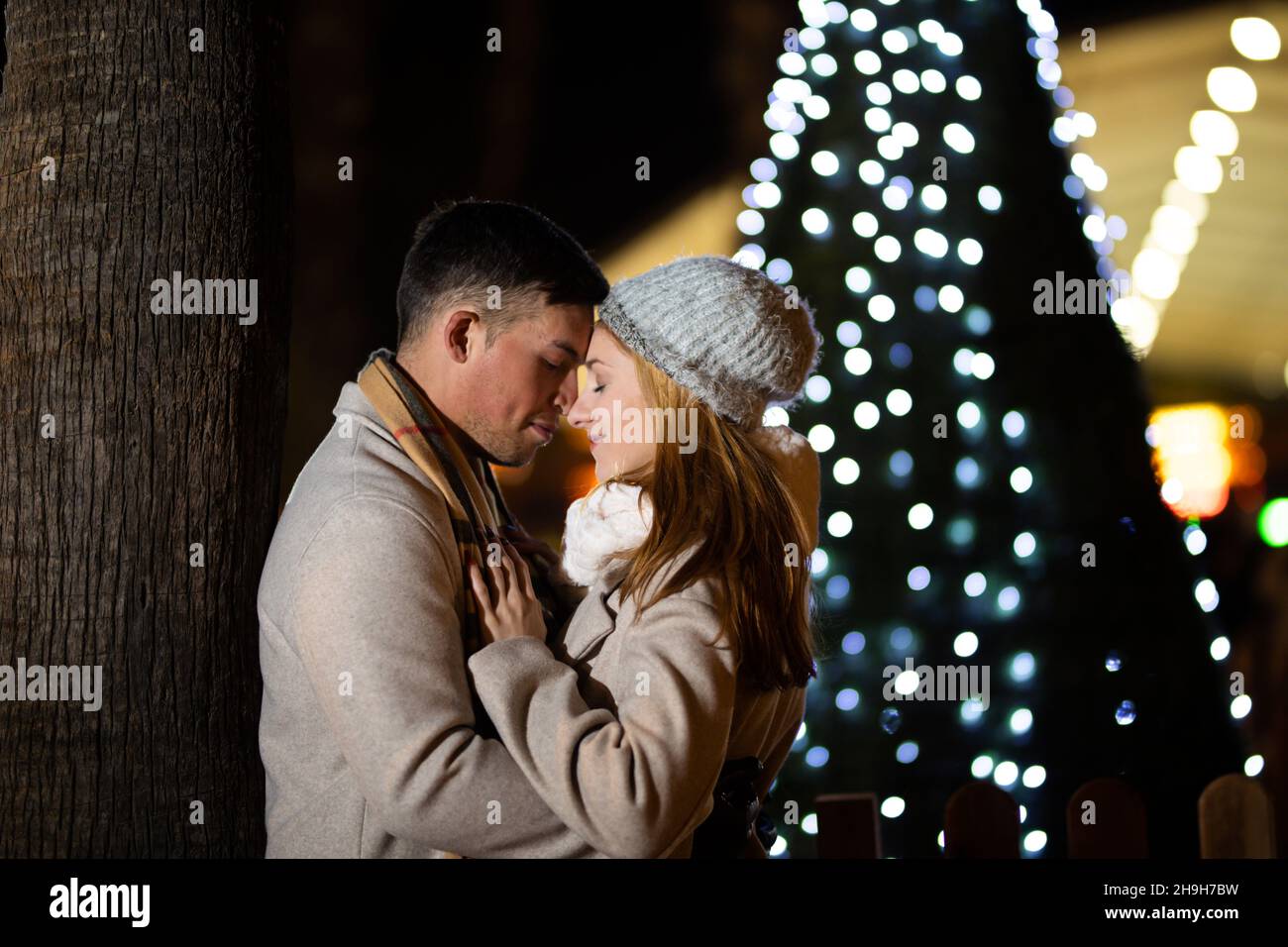 Teenage couple in love at christmas Stock Photo - Alamy