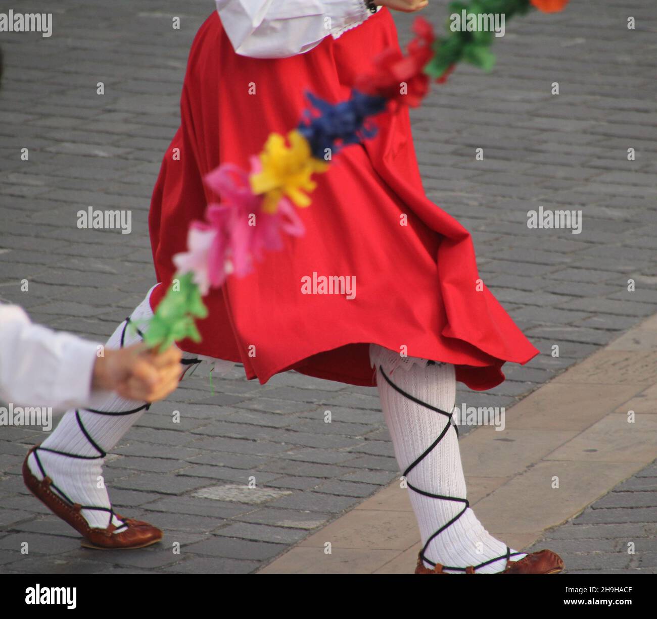 Group of people dancing folk dance outdoors in the Basque Country Stock ...