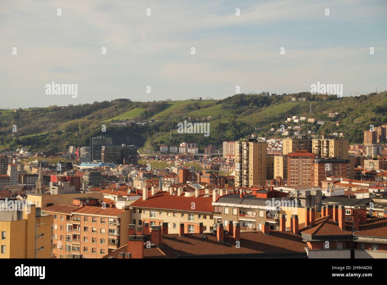 Aerial view of the buildings and highland of Bilbao city in Basque ...
