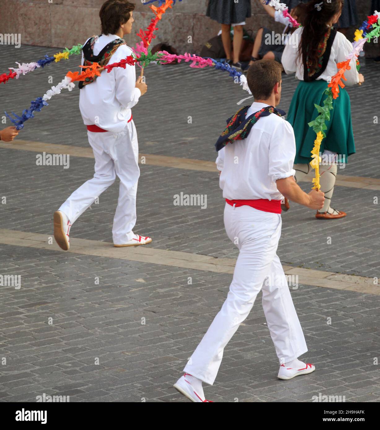 Group of people dancing folk dance outdoors in the Basque Country Stock ...