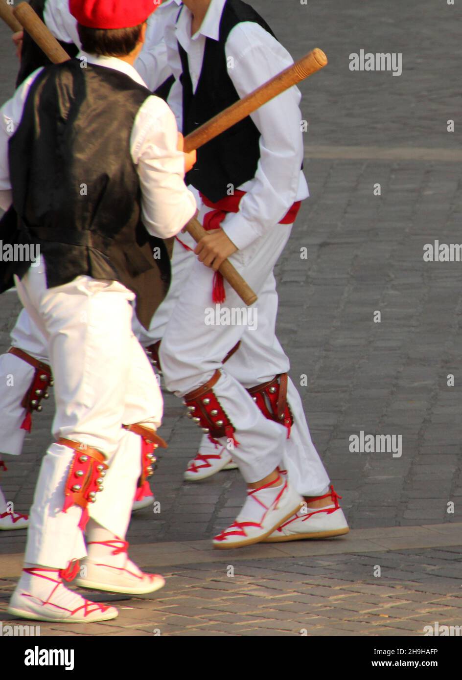 Group of people dancing folk dance outdoors in the Basque Country Stock ...