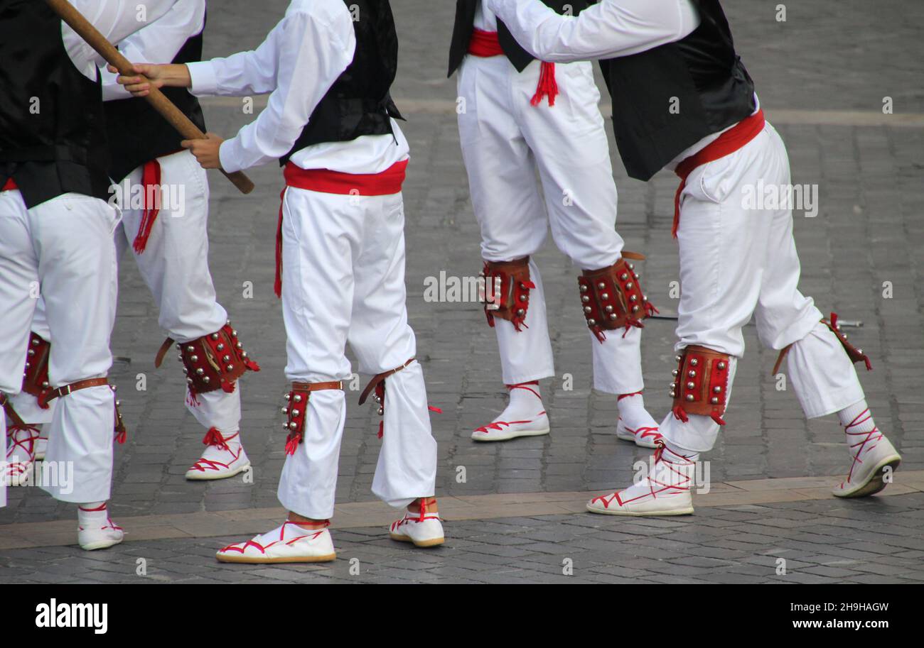 Group of people dancing folk dance outdoors in the Basque Country Stock ...