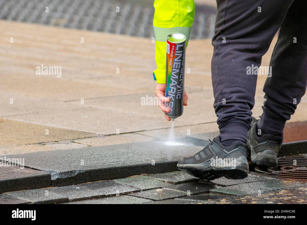 Preston Council workmen measuring pavement displacement for trip hazard ...