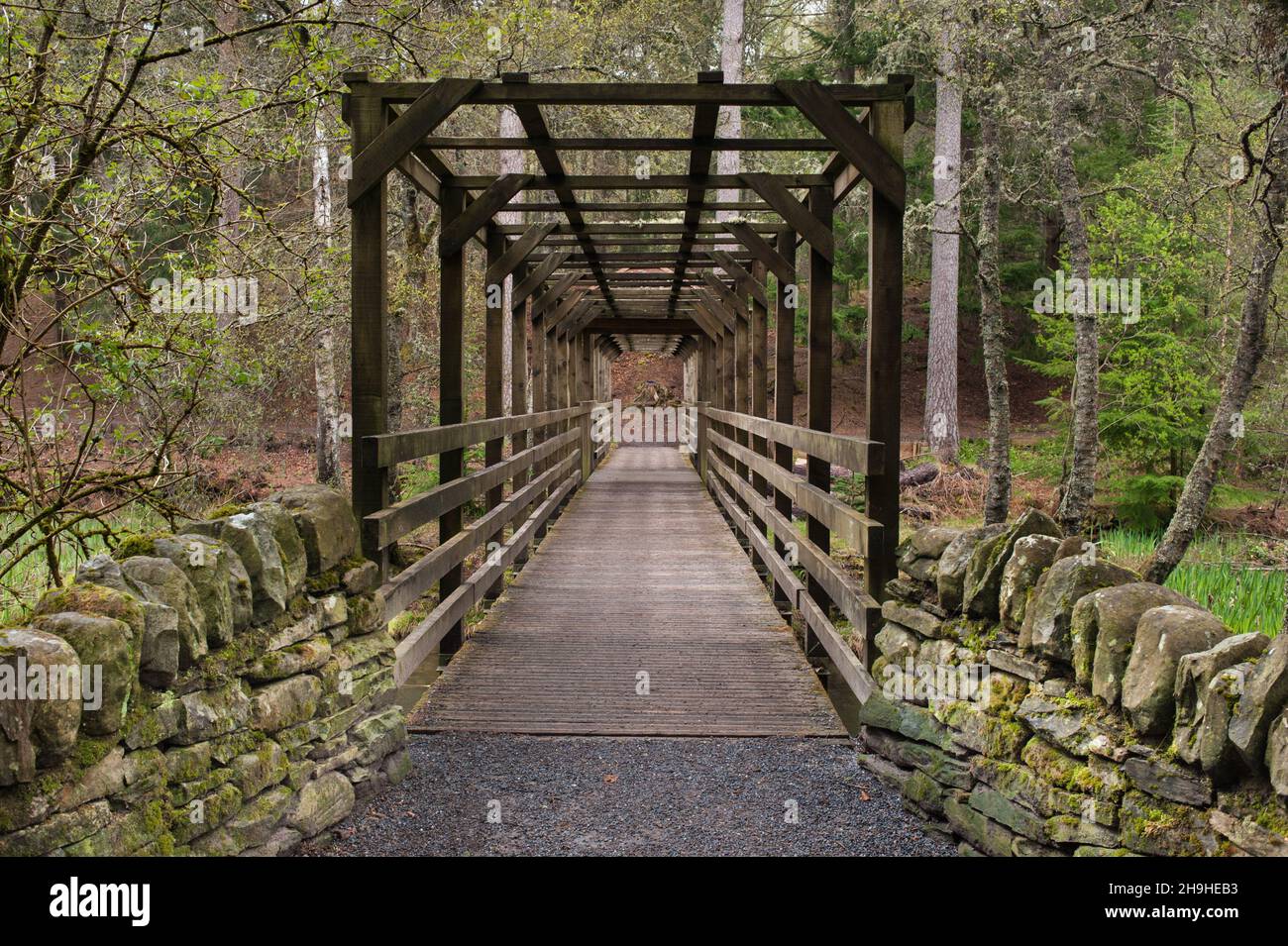 Stone bridge leading small hi-res stock photography and images - Alamy