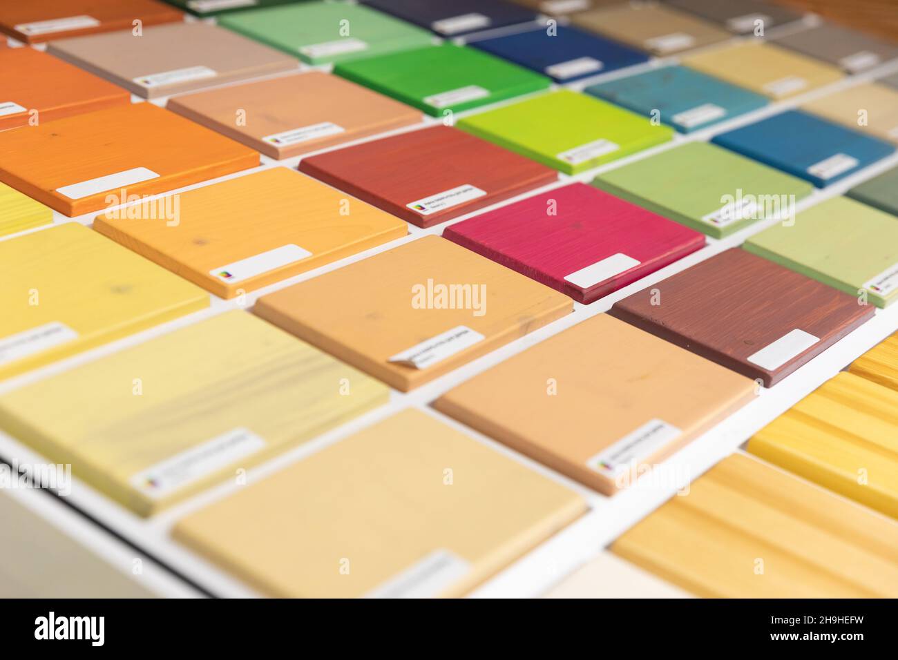 a palette of bright multi-colored wooden blocks painted with terraced ...