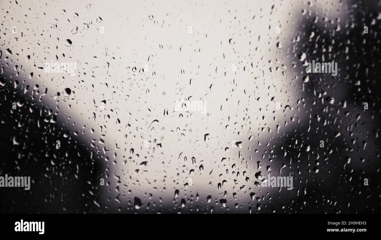Rain Drops On Window. Atmospheric Effect With Raindrops Stock Photo - Alamy