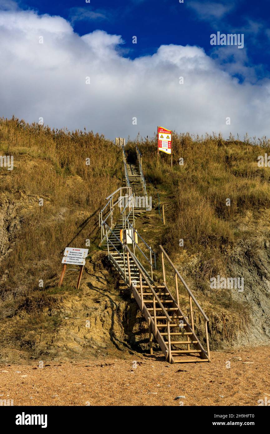 A temporary flight of steps down an unstable cliff at Burton Bradstock ...