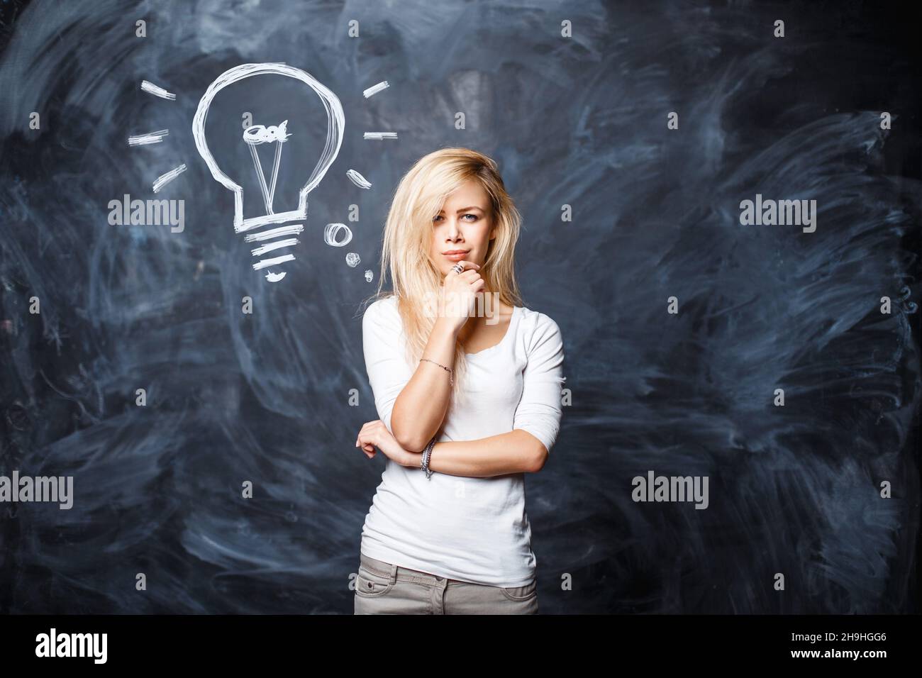 Woman light bulb thinking hi-res stock photography and images - Alamy