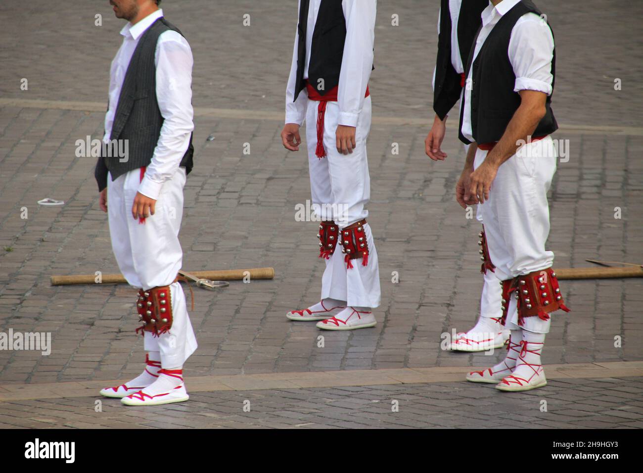 View of people with traditional clothes dancing a folk dance in Basque ...