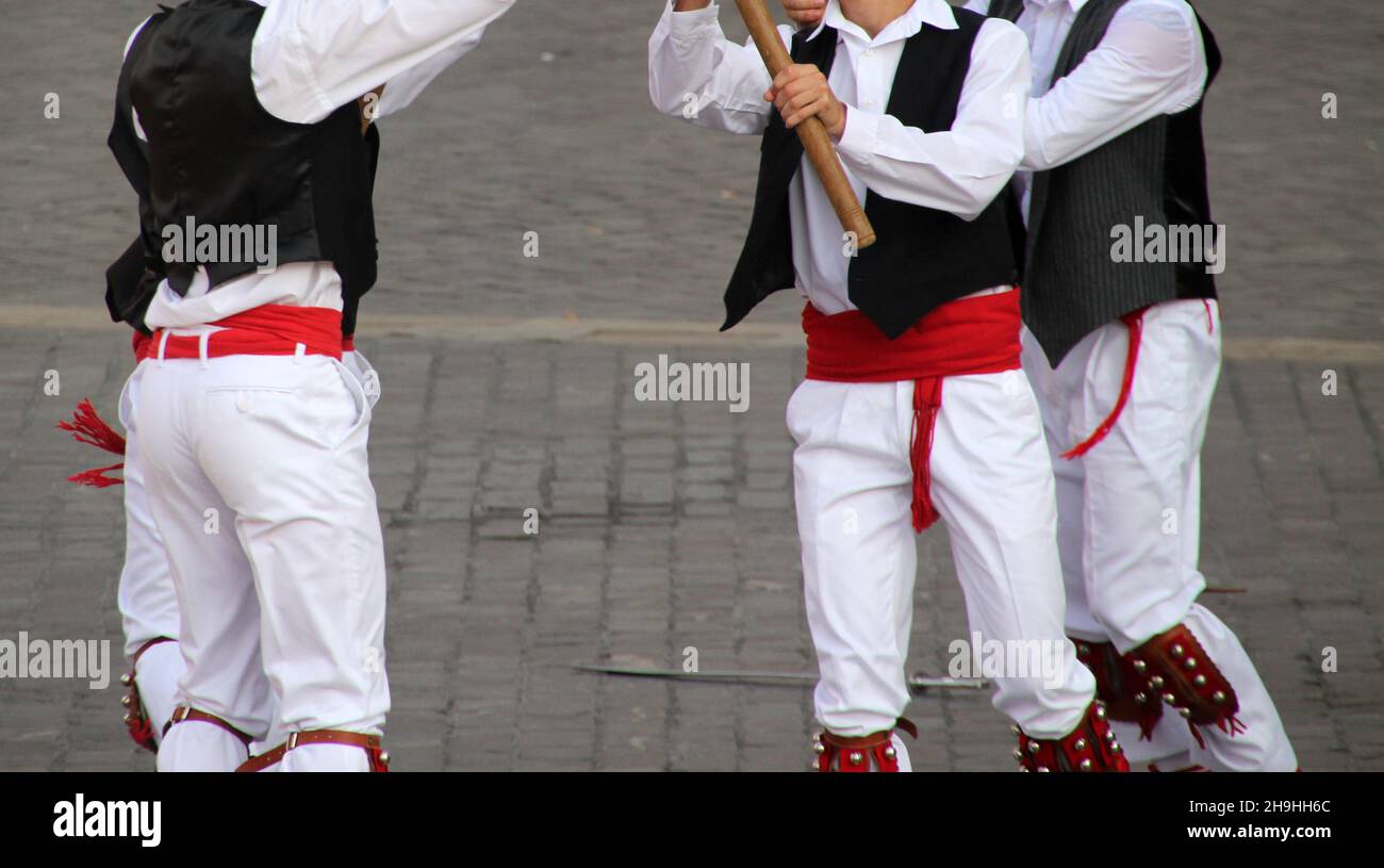 Beautiful shot of a group of people dancing a folk on festival in ...