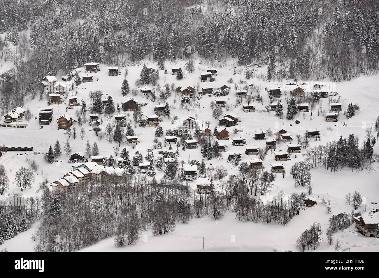 Mountain village covered with snow Stock Photo - Alamy